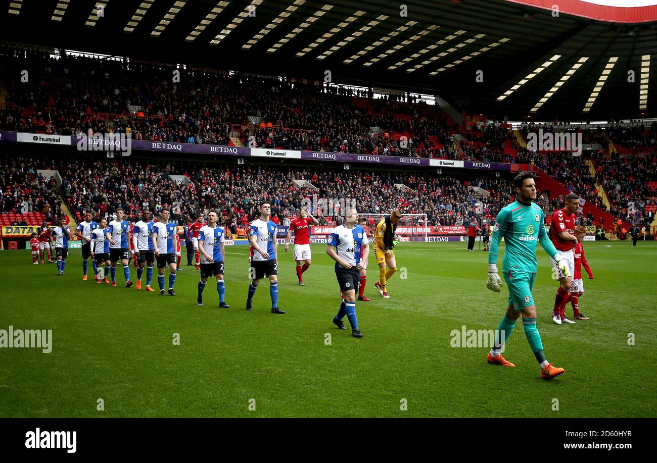 The two teams walk out before kick-off Stock Photo - Alamy