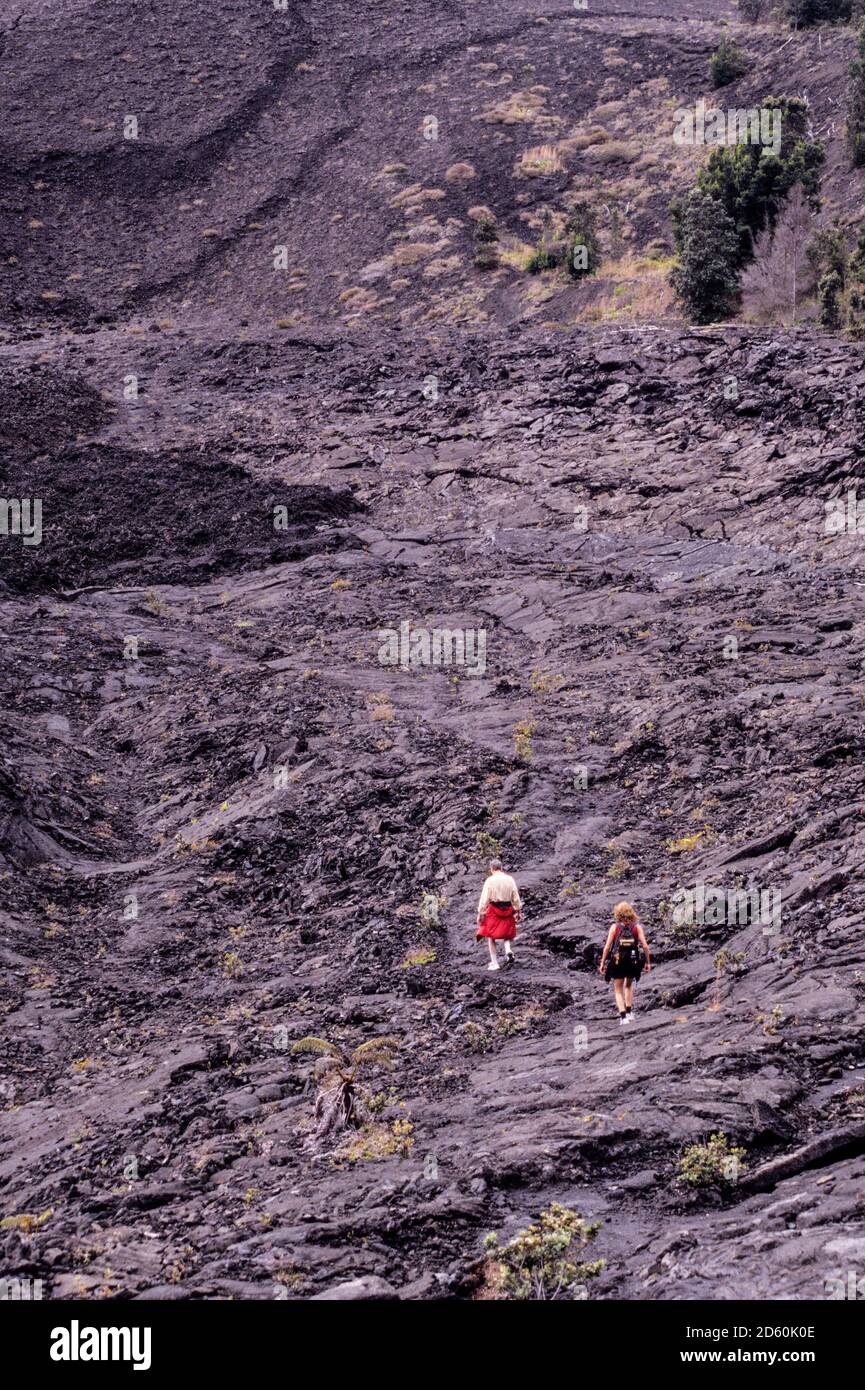 Hawaii Volcanoes National Park. Couple Hiking on Kilauea Iki Trail in ...
