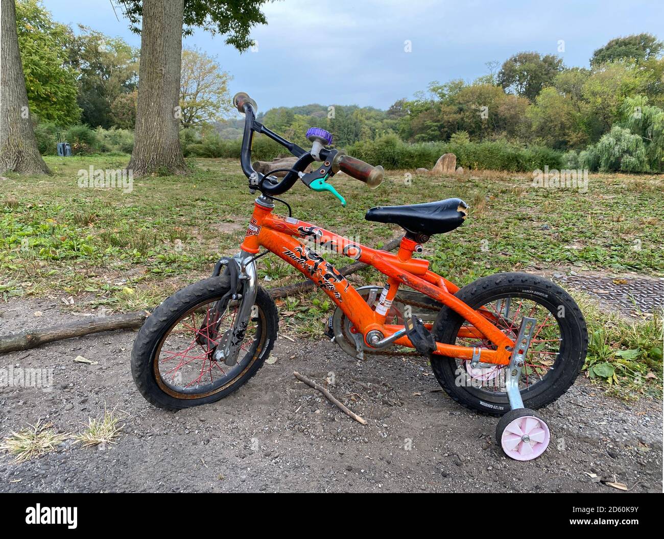 Childs training wheels hi-res stock photography and images - Alamy