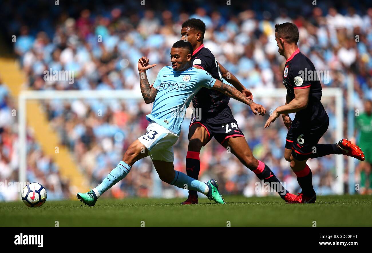 Manchester City's Gabriel Jesus (left) and Huddersfield Town's Steve ...