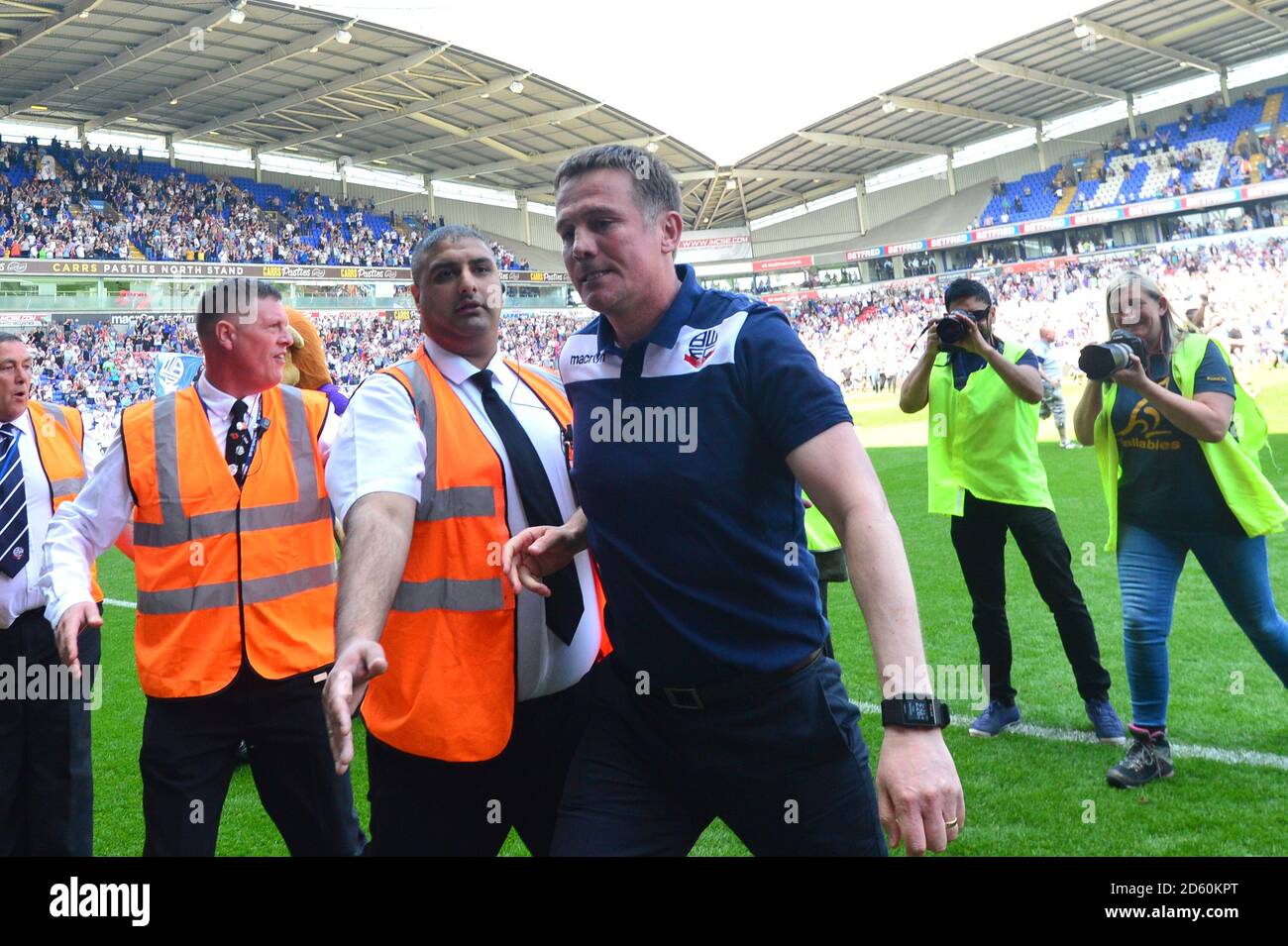 Bolton Wanderers manager Phil Parkinson leaves the pitch after the ...