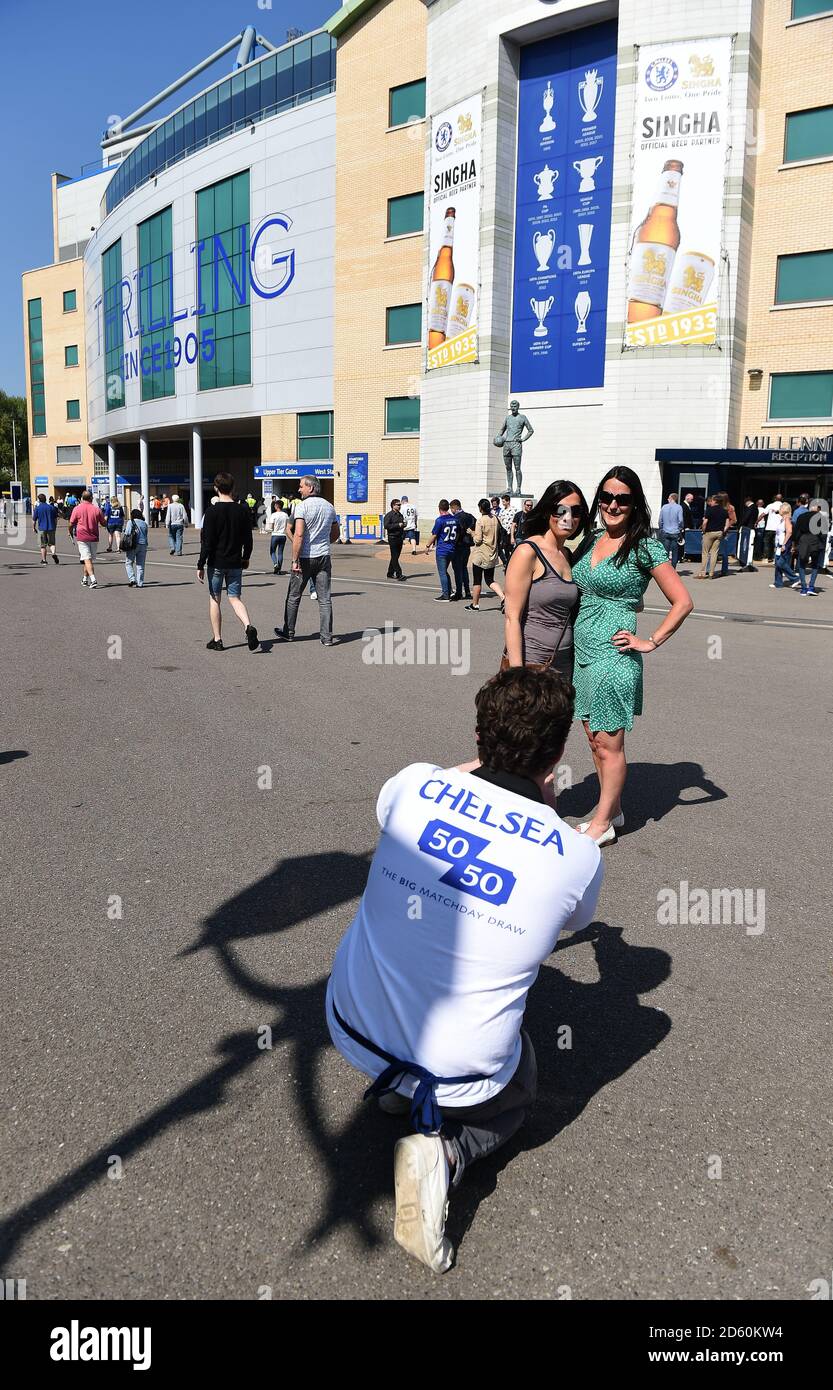 Two fans have their photograph taken ahead of kick off Stock Photo - Alamy