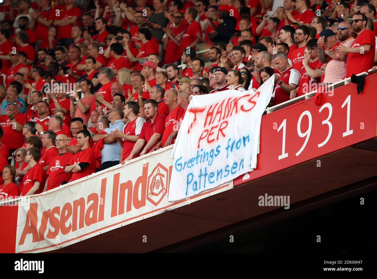 Arsenal fans hold hi-res stock photography and images - Alamy
