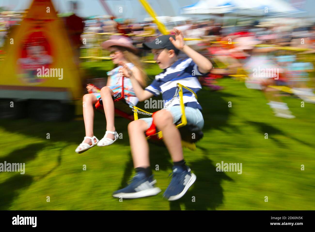 Children enjoy the carousel during Kids Carnival Day at warwick Races ...
