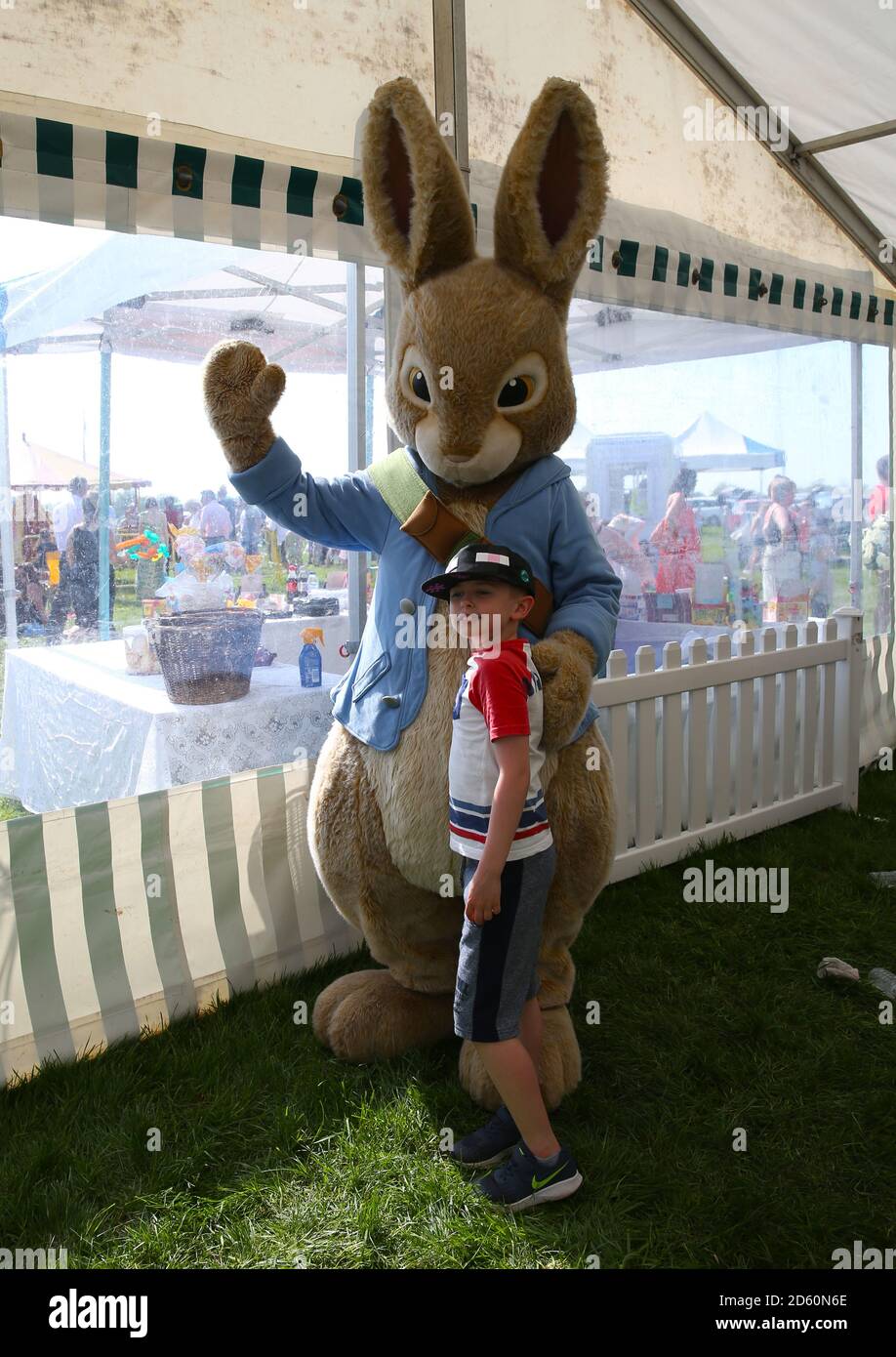 Racegoers meet Peter Rabbit during Kid's Carnival Day at Warwick Races ...