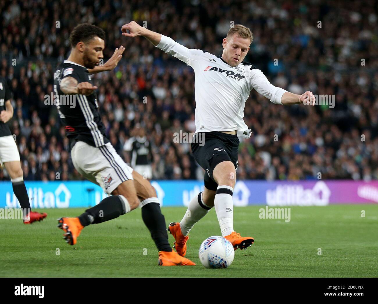 Derby County's Matej Vydra (right) and Fulham's Ryan Fredericks battle ...
