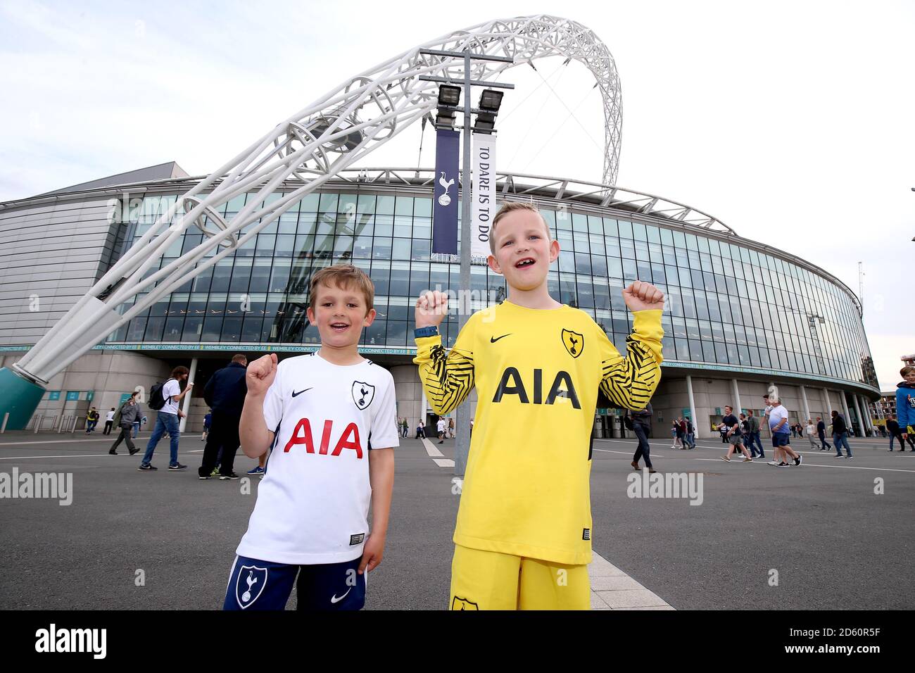 Young Tottenham Hotspur supporters pose outside the stadium before the ...