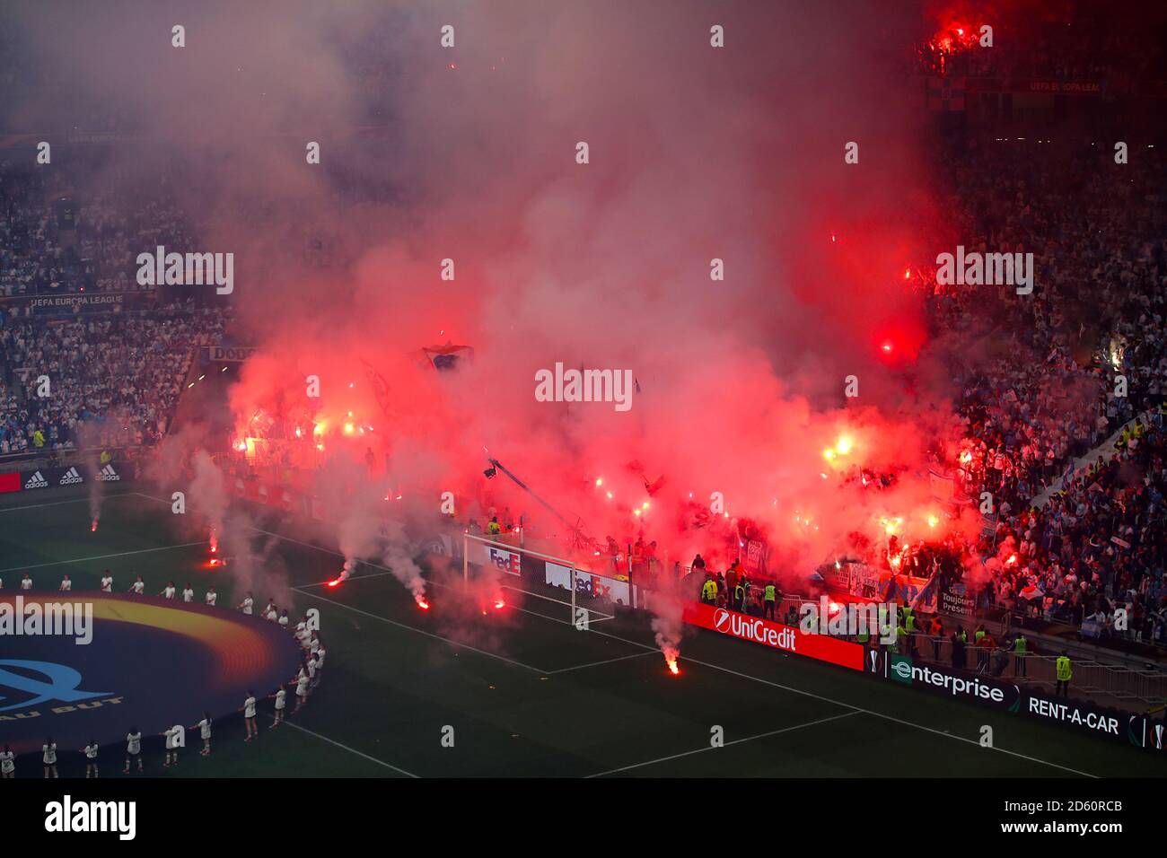 Marseille fans let of flares in the stands ahead of the match Stock ...