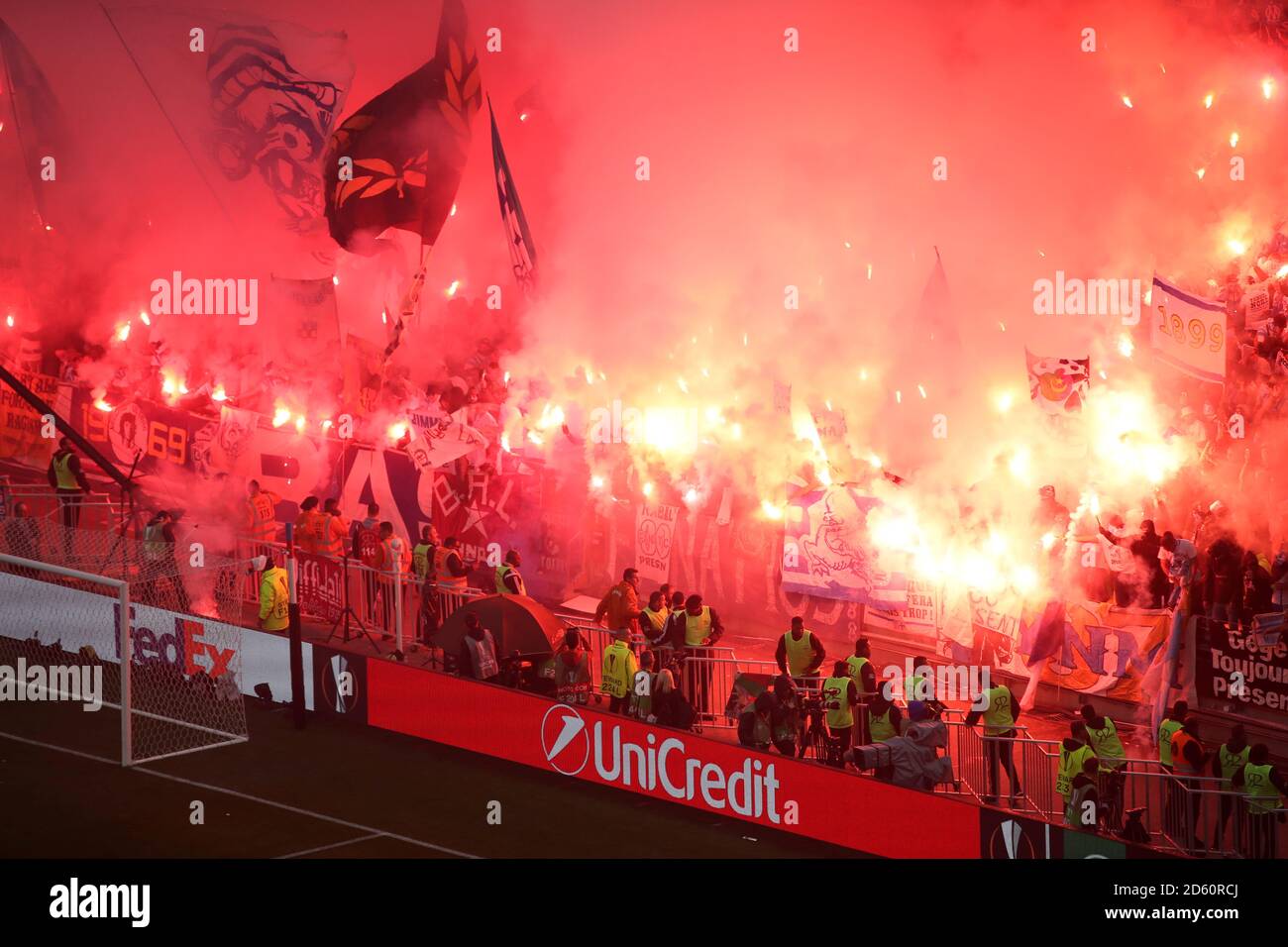 Marseille fans let of flares in the stands ahead of the match Stock ...