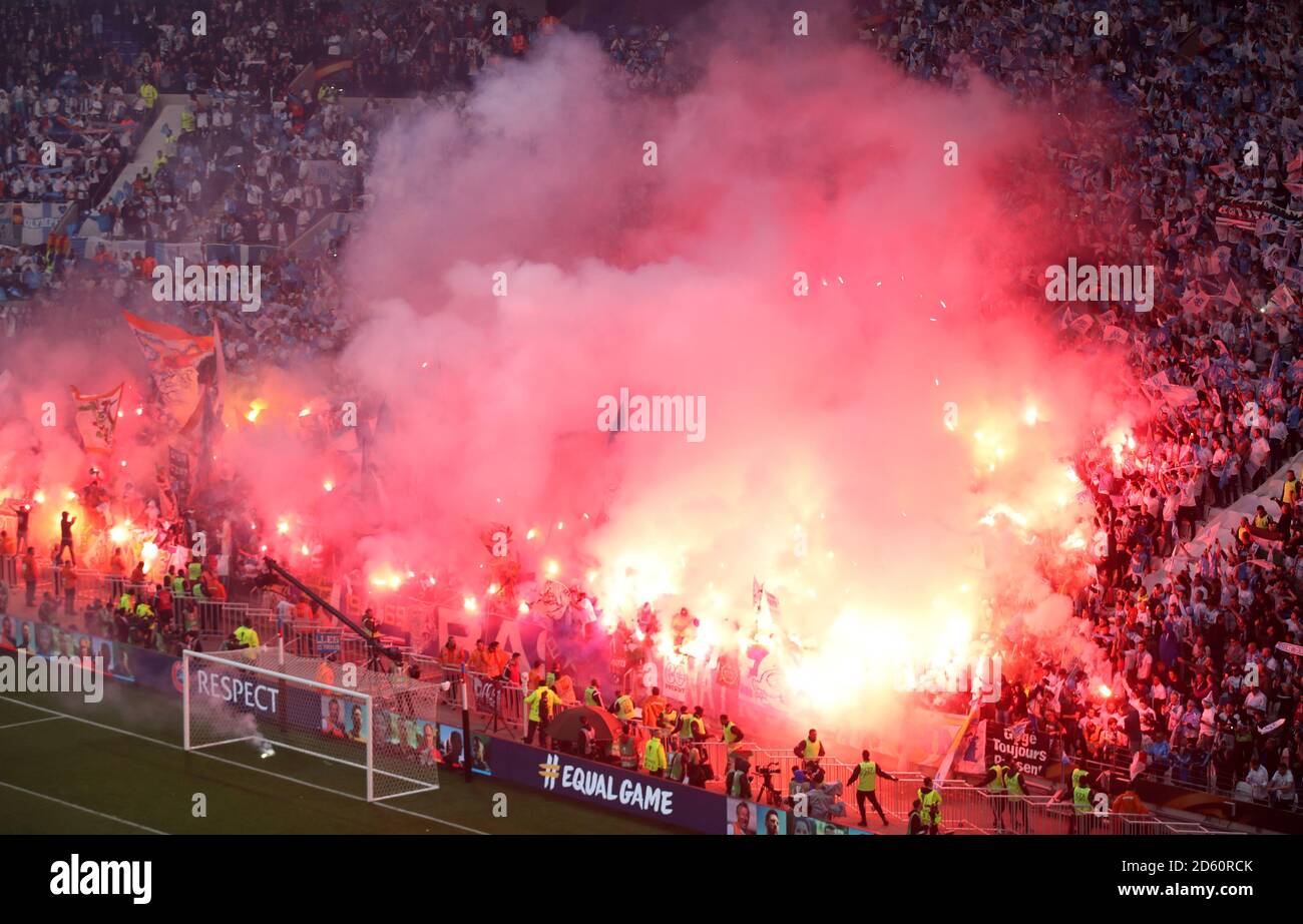 Marseille fans let of flares in the stands ahead of the match Stock ...