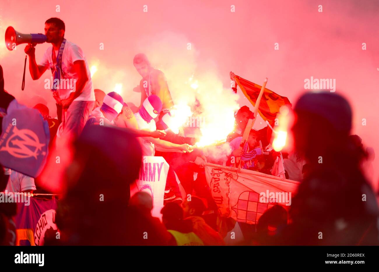 Marseille fans light flares in the stands Stock Photo - Alamy