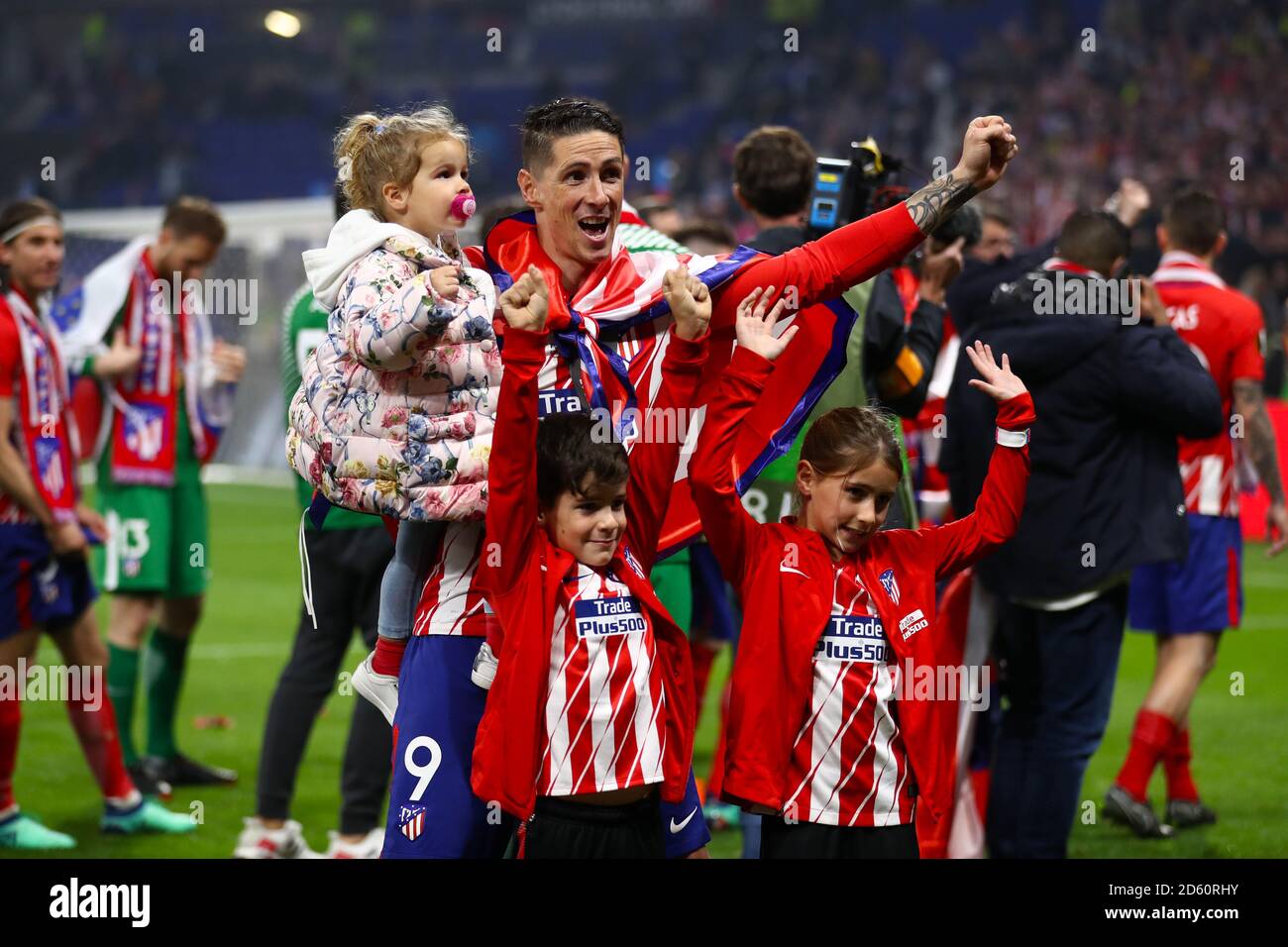 Atletico Madrid's Fernando Torres celebrates on the pitch with his ...
