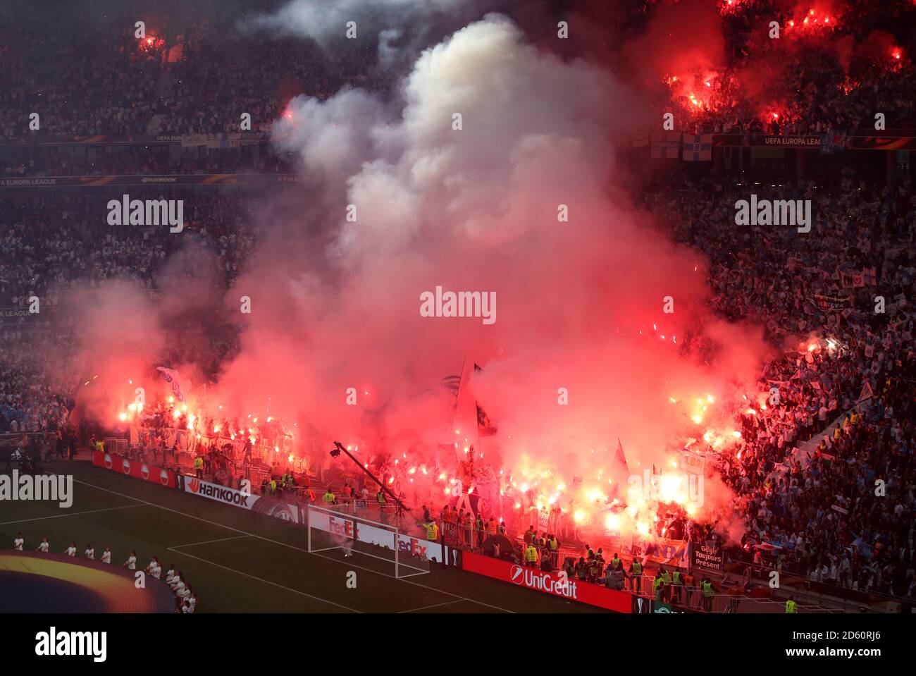 Marseille fans light flares in the stands Stock Photo - Alamy