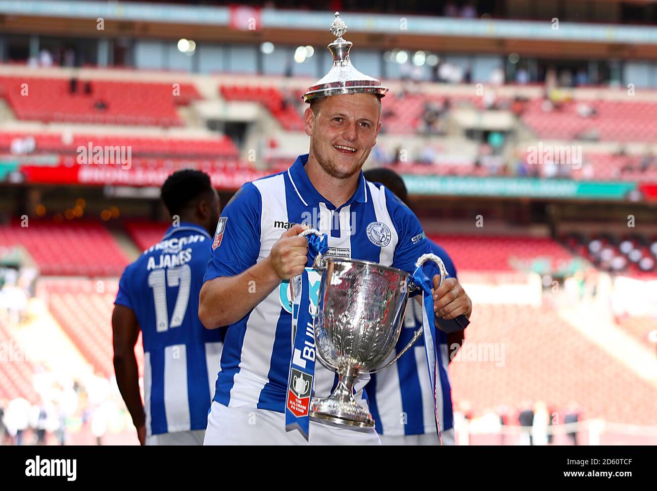 Thatcham Town's Shane Cooper-Clark celebrates with the trophy Stock ...