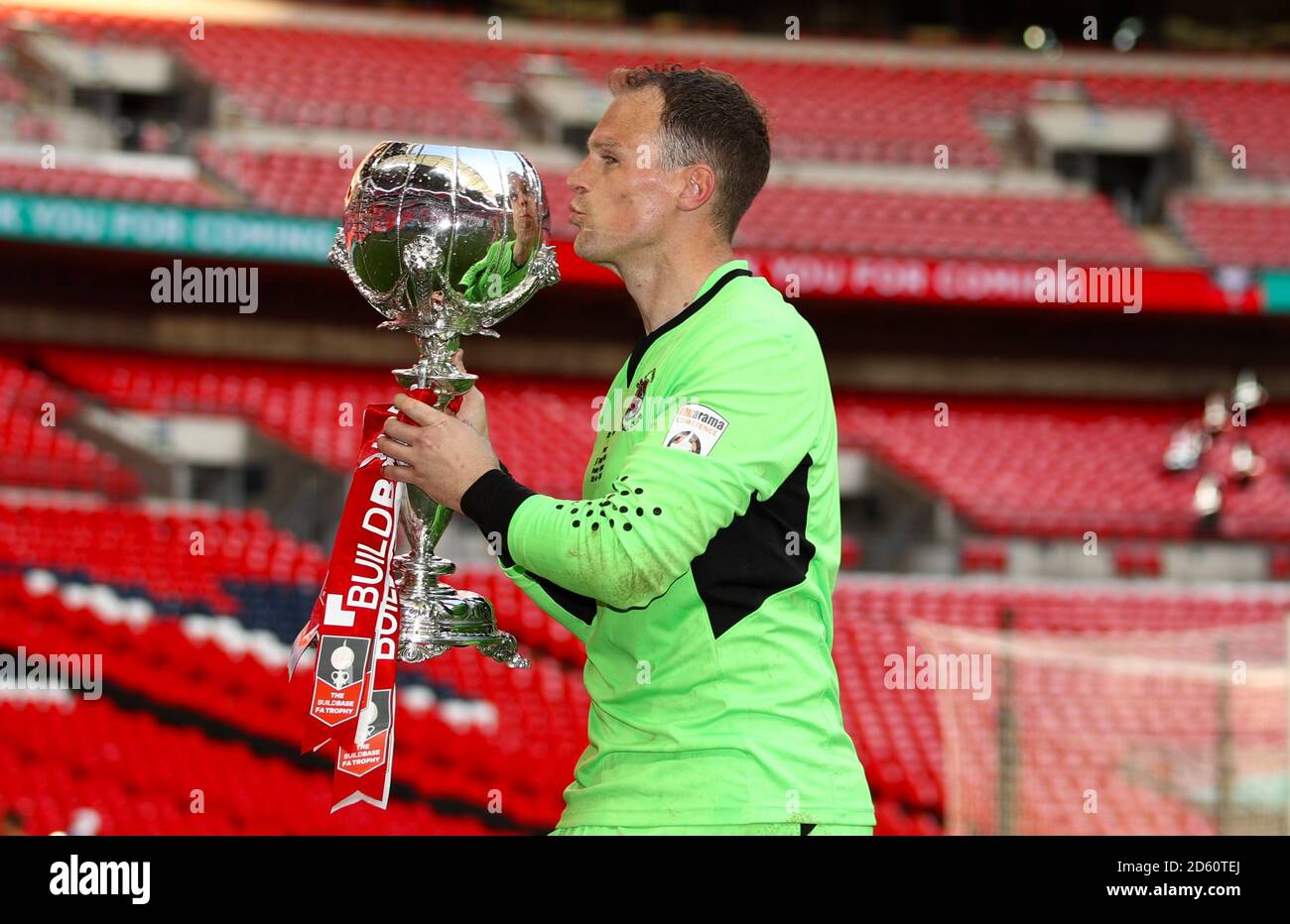 Brackley Town goalkeeper Danny Lewis celebrates with the Buildbase FA ...
