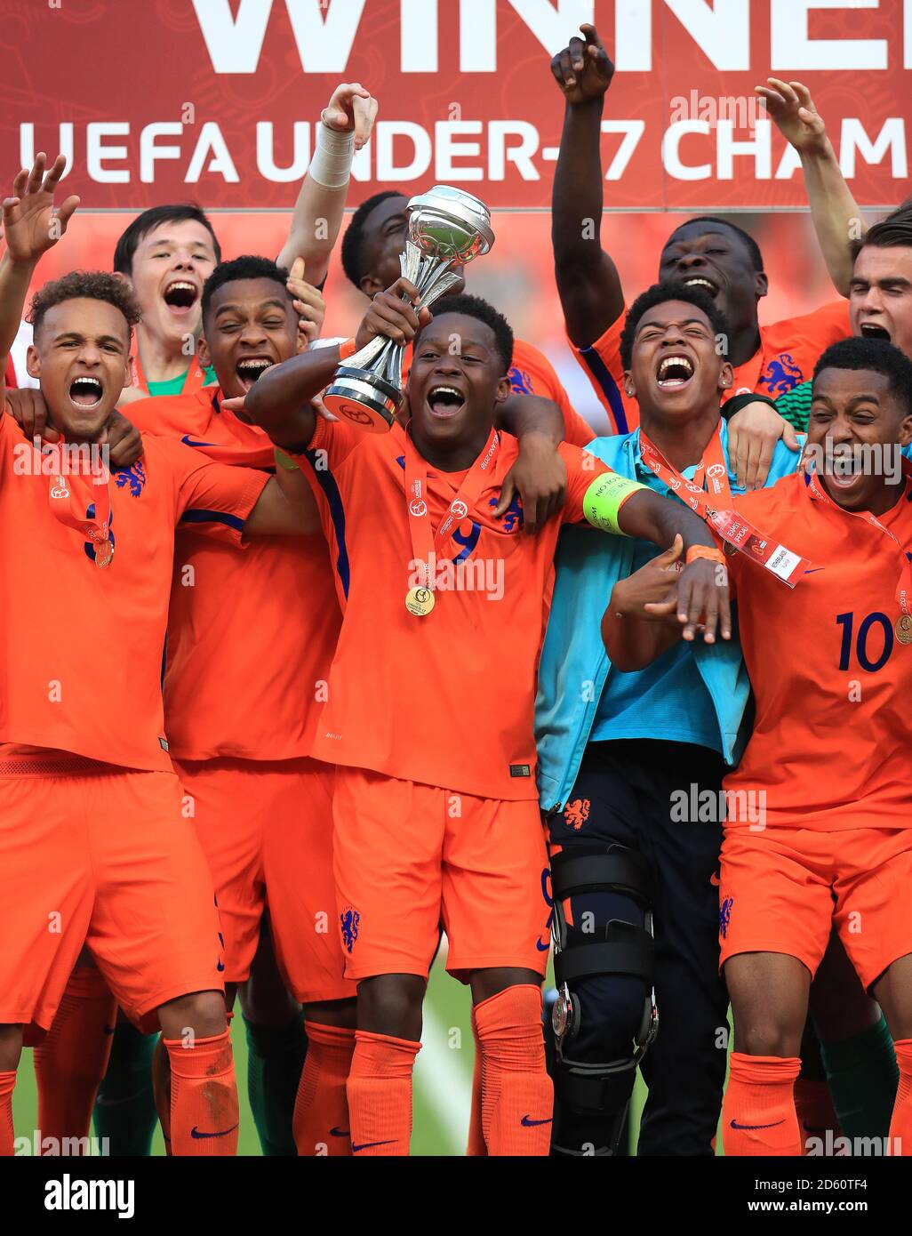 Netherlands U17's captain Daishawn Redan lifts the trophy Stock Photo ...