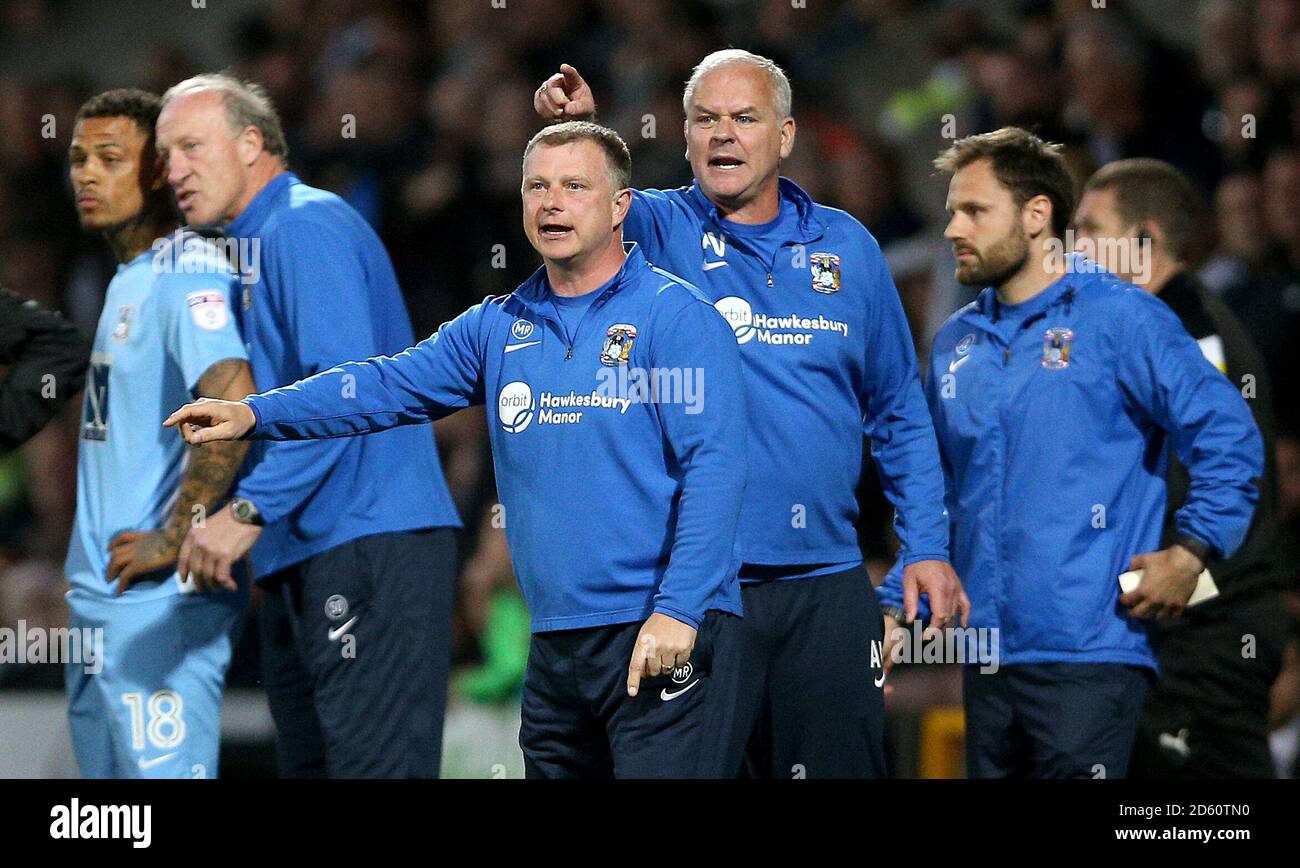 Coventry City manager Mark Robins (left) and assistant Adrian Viveash ...