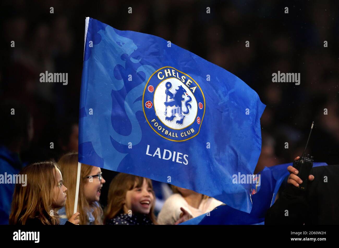 Chelsea fans in the stand show their support Stock Photo - Alamy