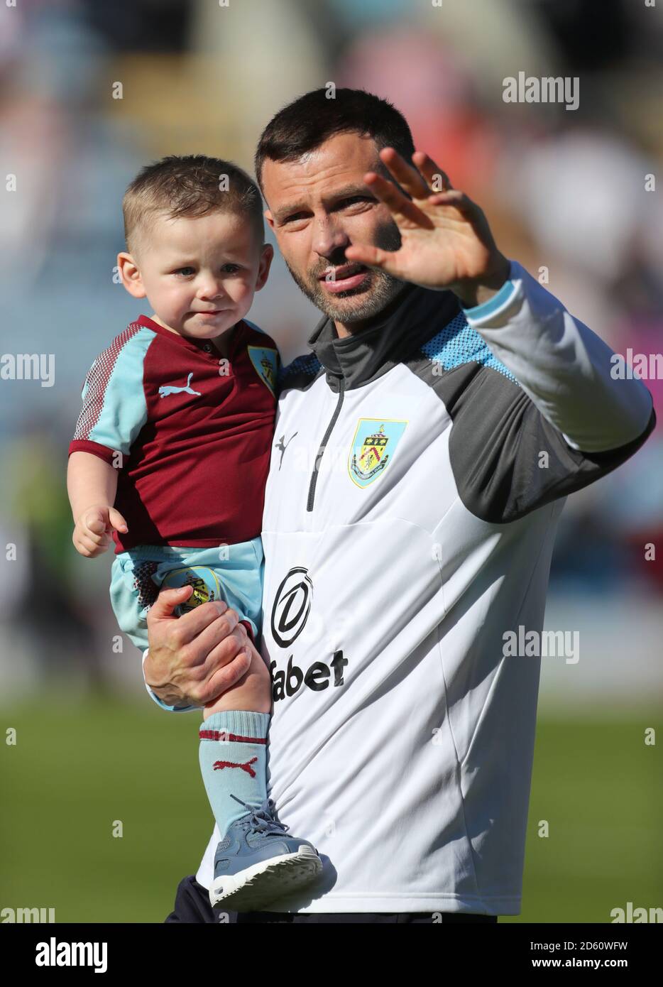 Burnley's Phil Bardsley celebrates on the pitch after the final whistle ...