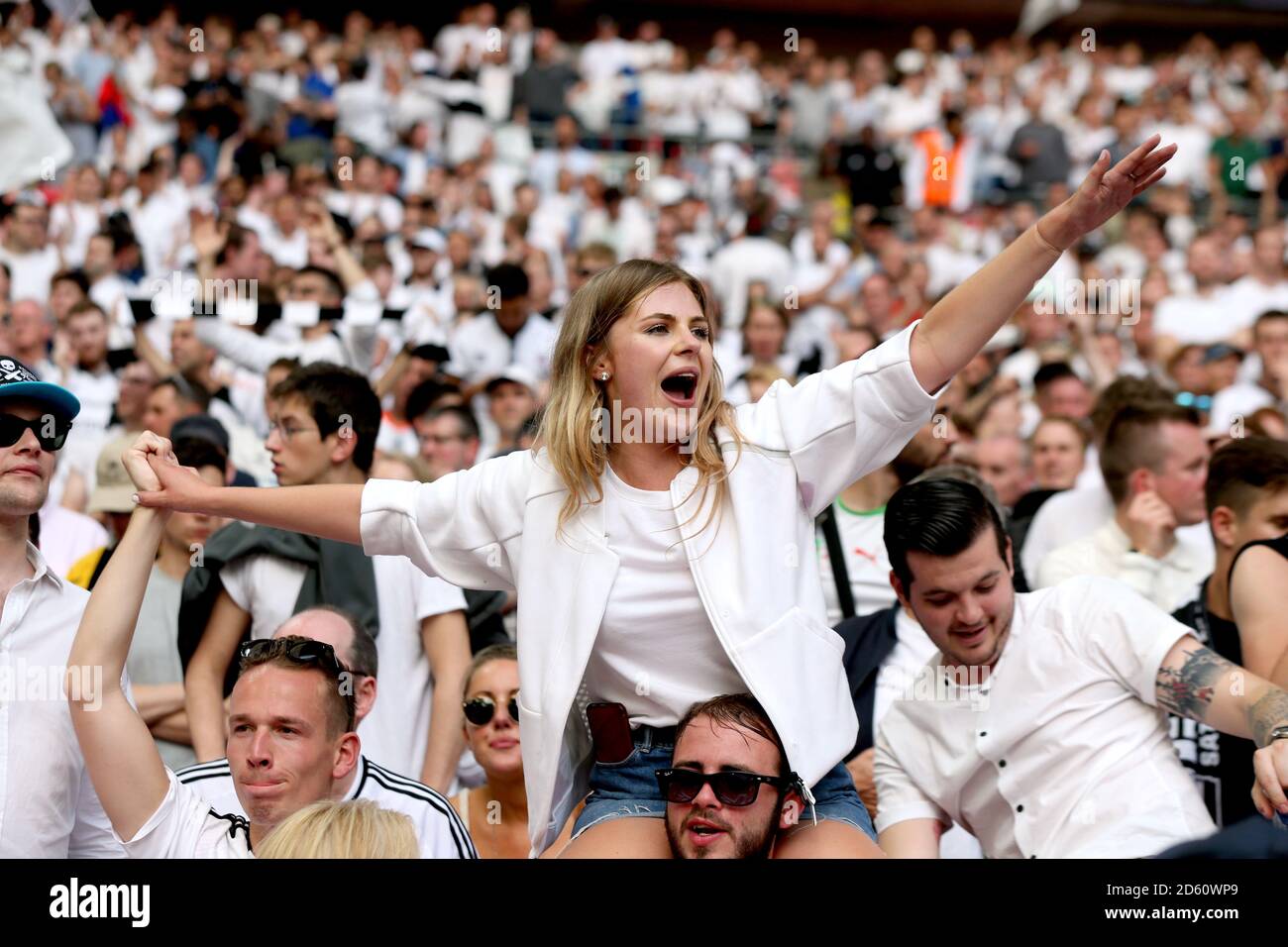 Fulham fans in the crowd celebrate after the final whistle Stock Photo ...