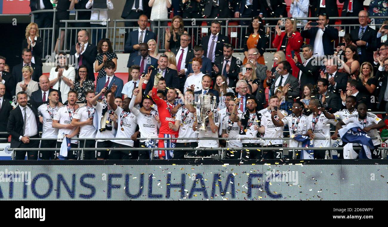 Fulham players celebrate promotion after the final whistle during the ...