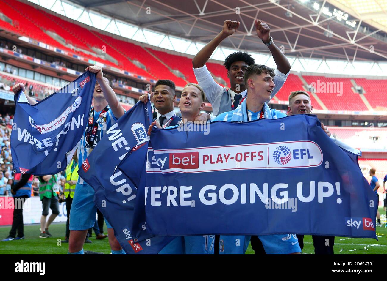 Coventry City's Tom Bayliss (second right) celebrates promotion to Sky ...