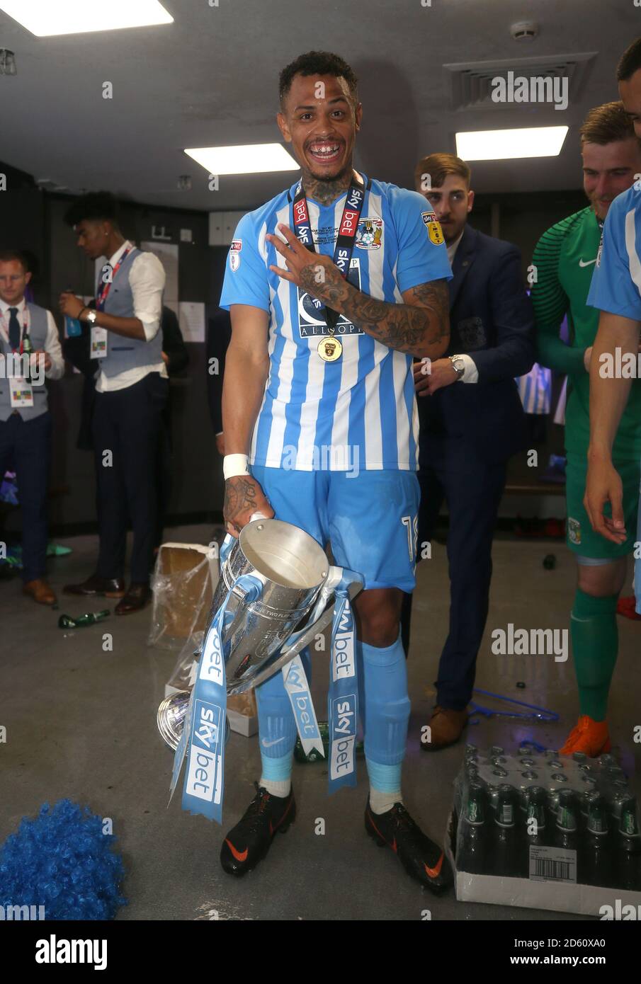 Coventry City's Jonson Clarke-Harris celebrate in the dressing room ...