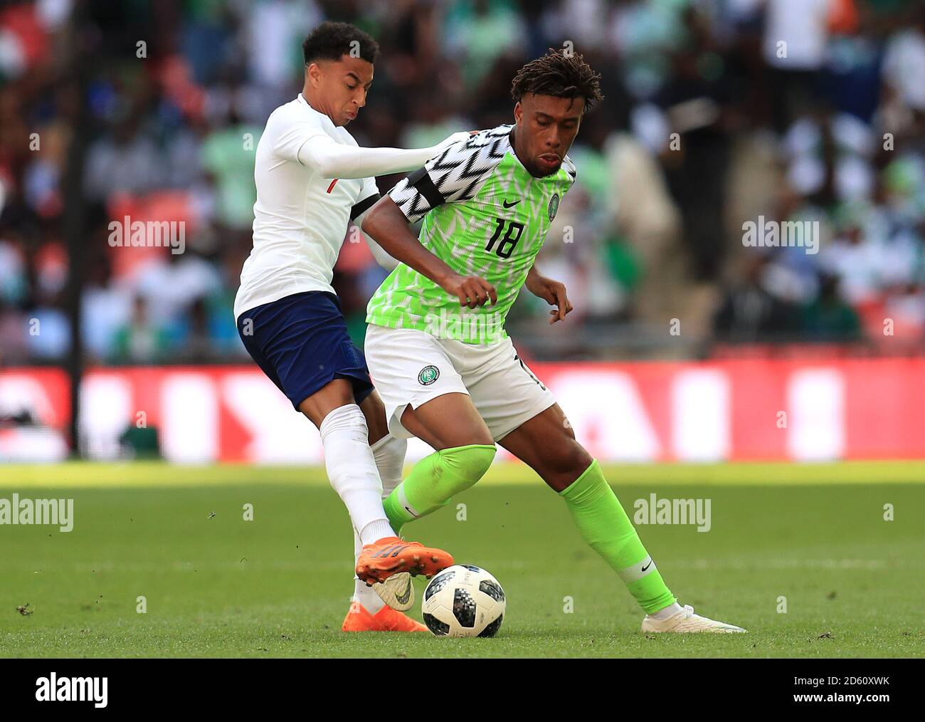 England's Jesse Lingard (left) and Nigeria's Alex Iwobi Stock Photo - Alamy
