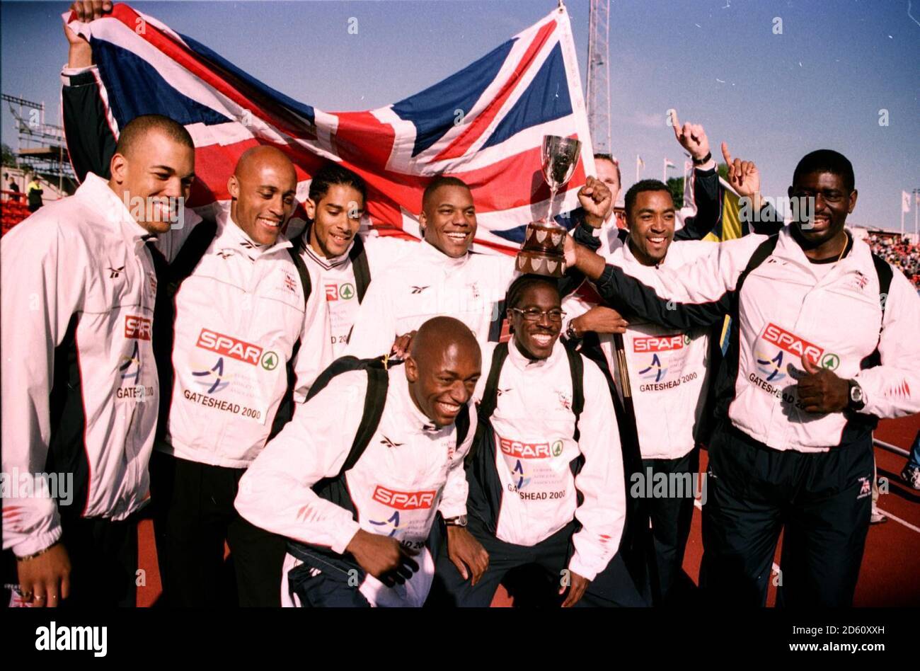 Memebers of the Great Britain squad celebrate with the trophy after a ...