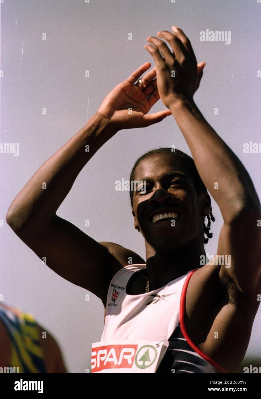 Great Britain's Christian Malcolm celebrates winning the men's 200m ...