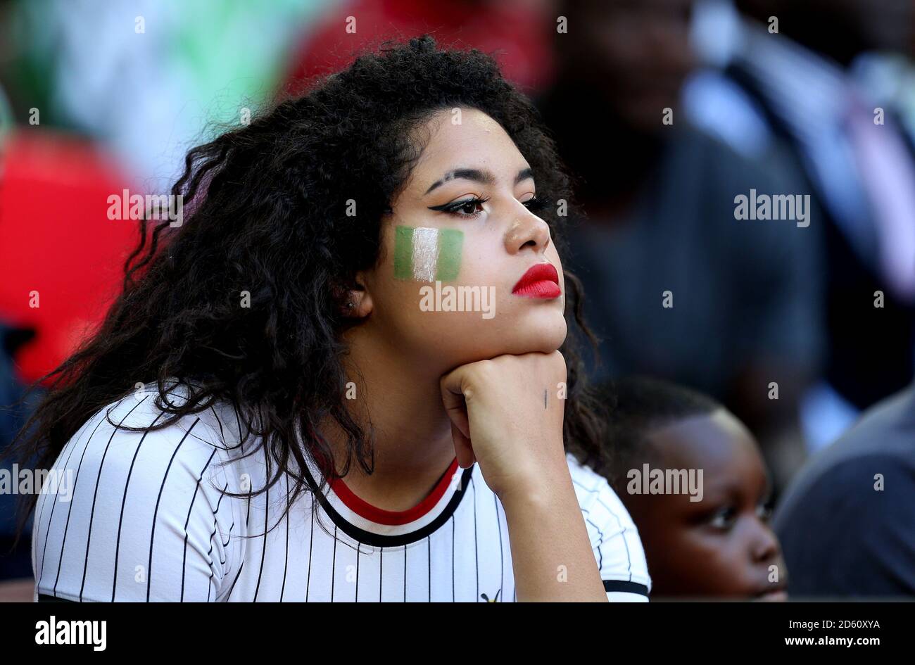 Nigeria's fan looks dejected during the game Stock Photo - Alamy