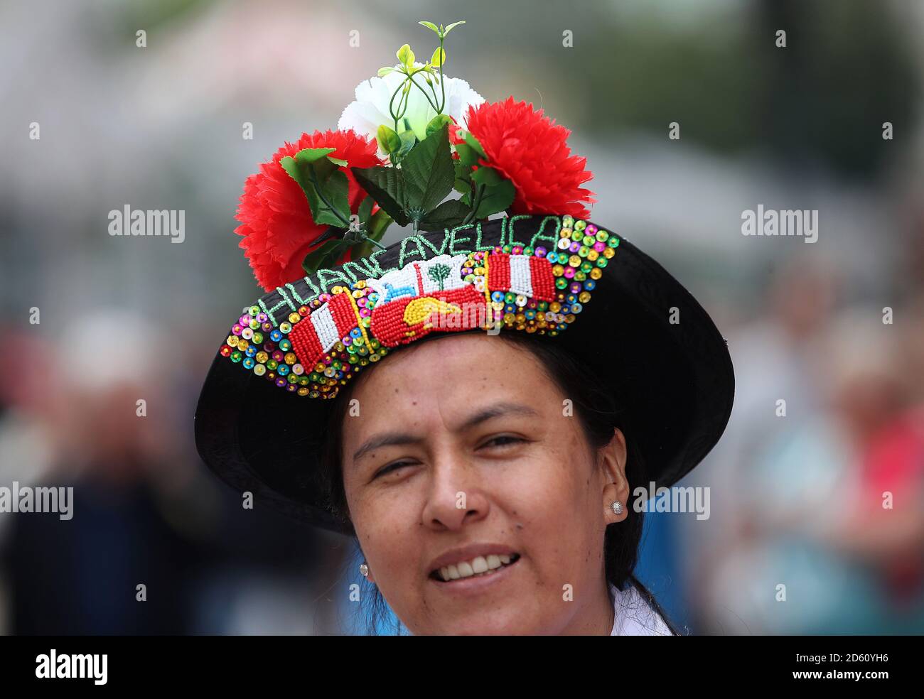 A fan of Peru in traditional dress with a hat from Huancavelica prior ...