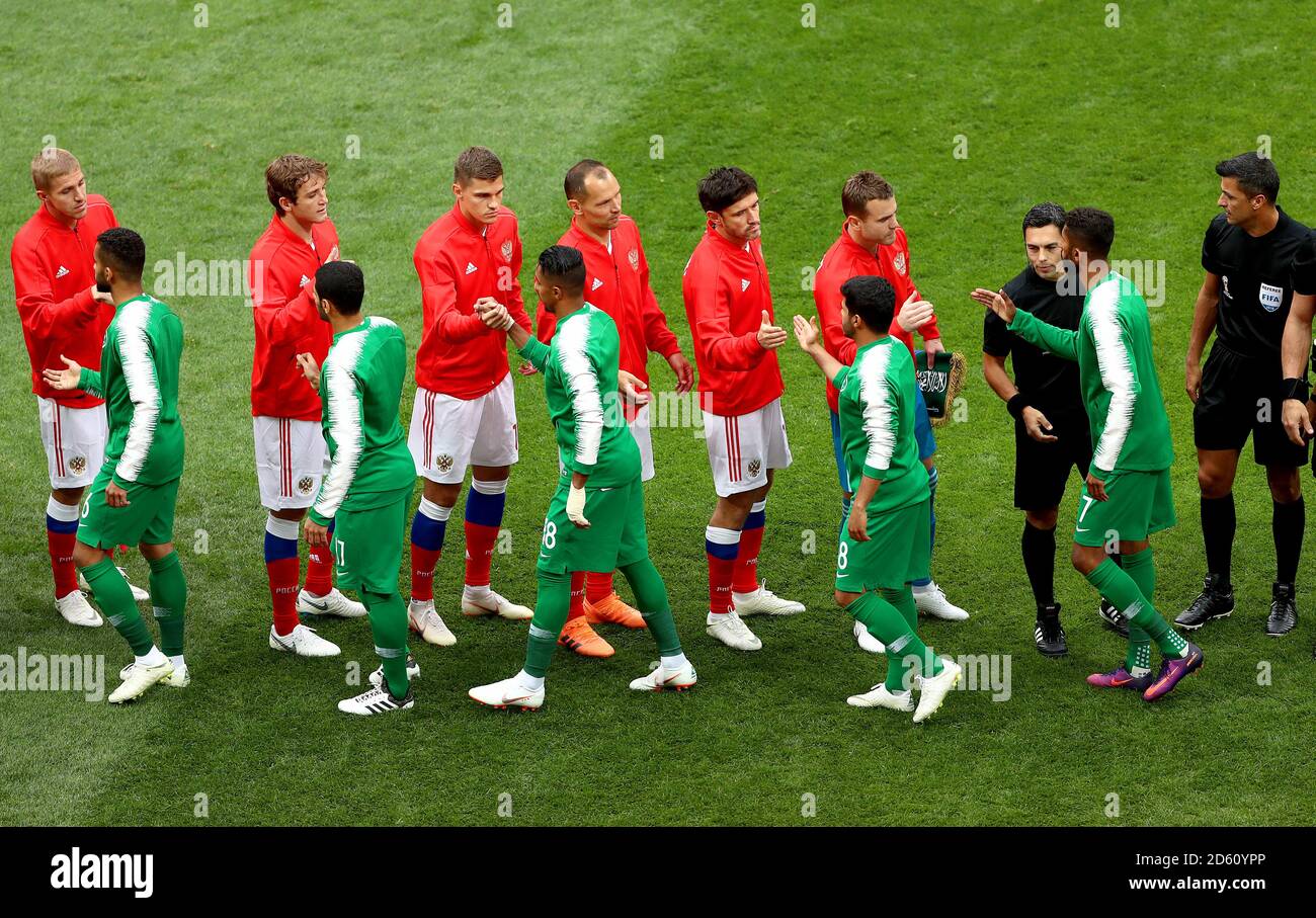 The two team's shake hands before kick-off Stock Photo - Alamy