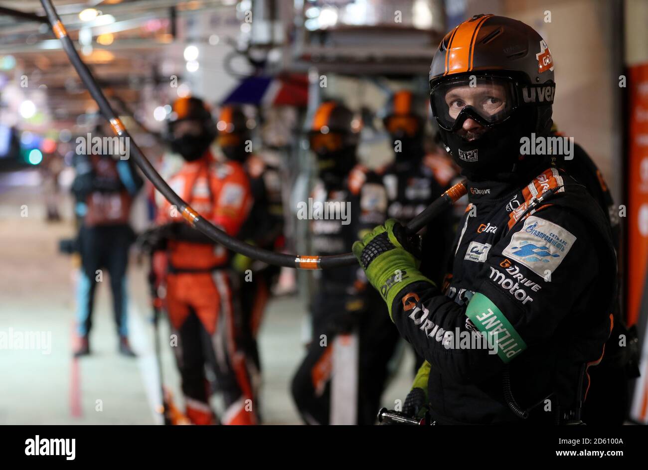 Mechanic waits for a pit stop Stock Photo - Alamy
