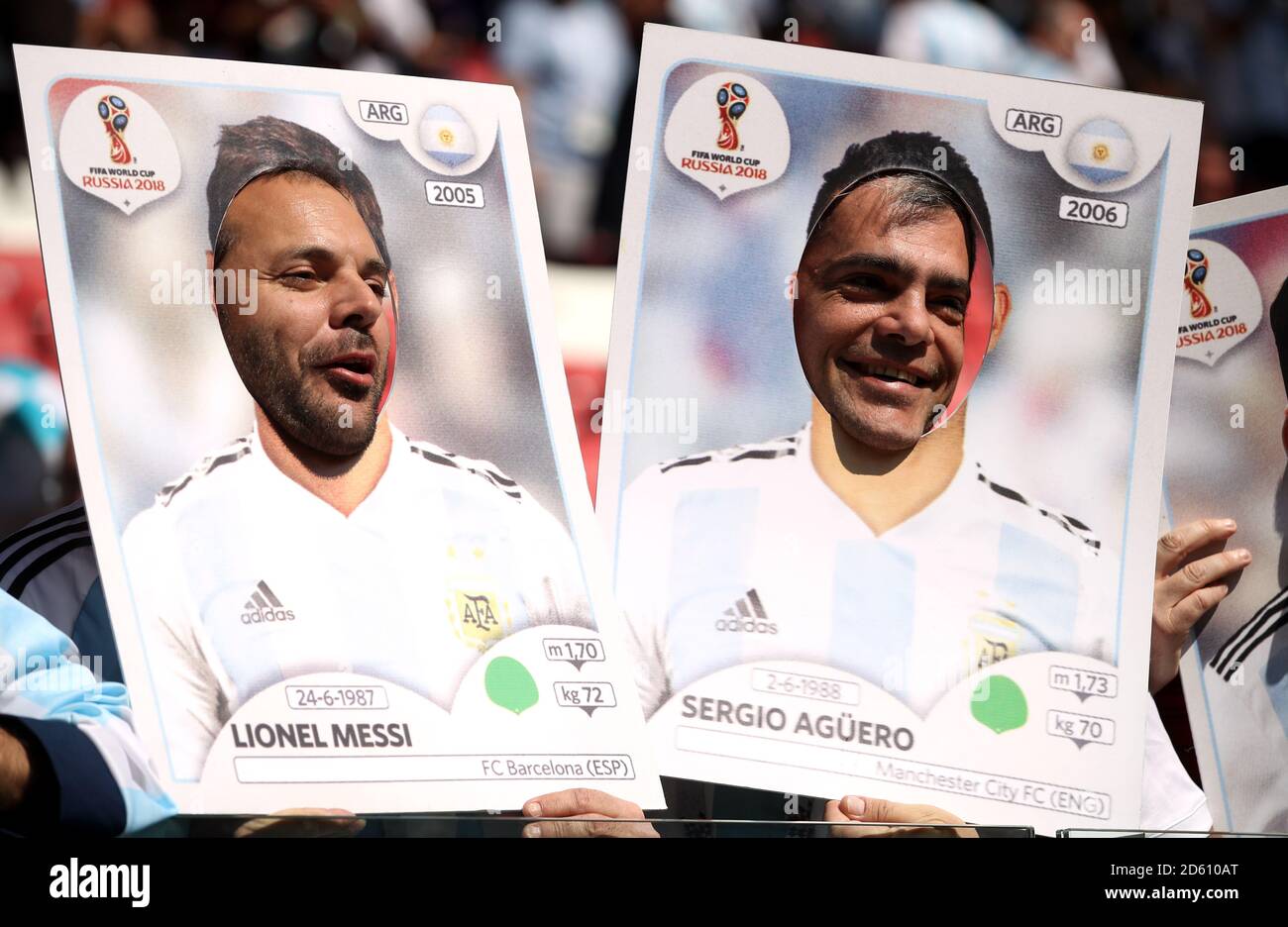 Two Argentina fans wearing giant Panini stickers of Lionel Messi and ...