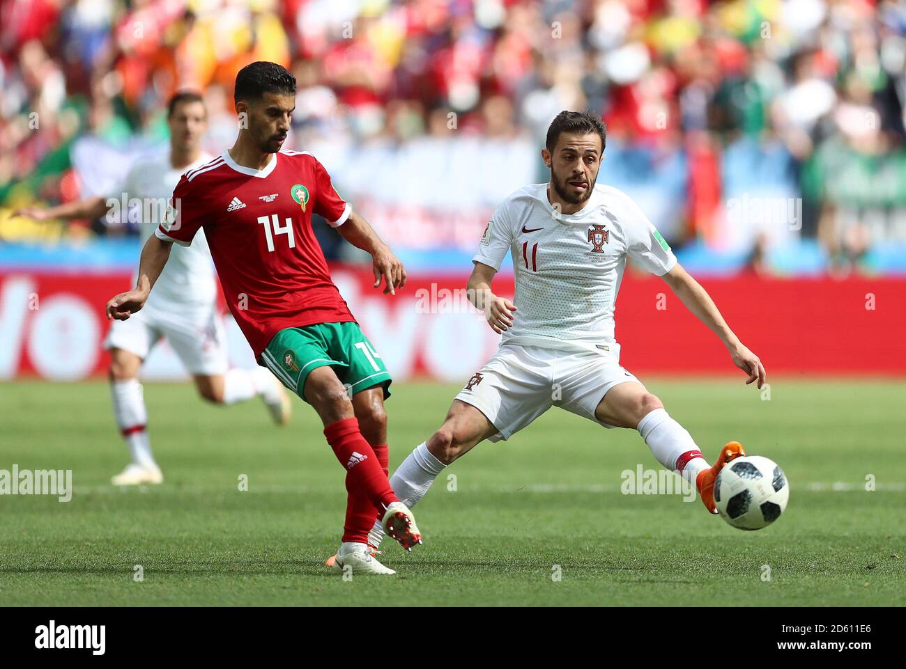 Morocco's Mbark Boussoufa (left) and Portugal's Bernardo Silva battle ...