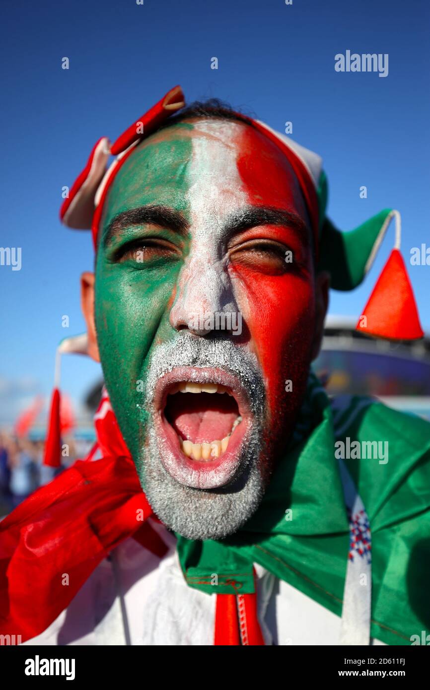 An Iran fan wearing facepaint ahead of the match Stock Photo - Alamy