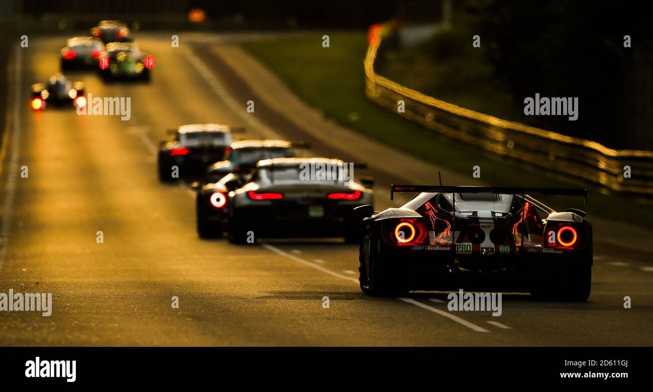 Sun sets down the Mulsanne Straight during the Le Mans 24hrs Stock ...