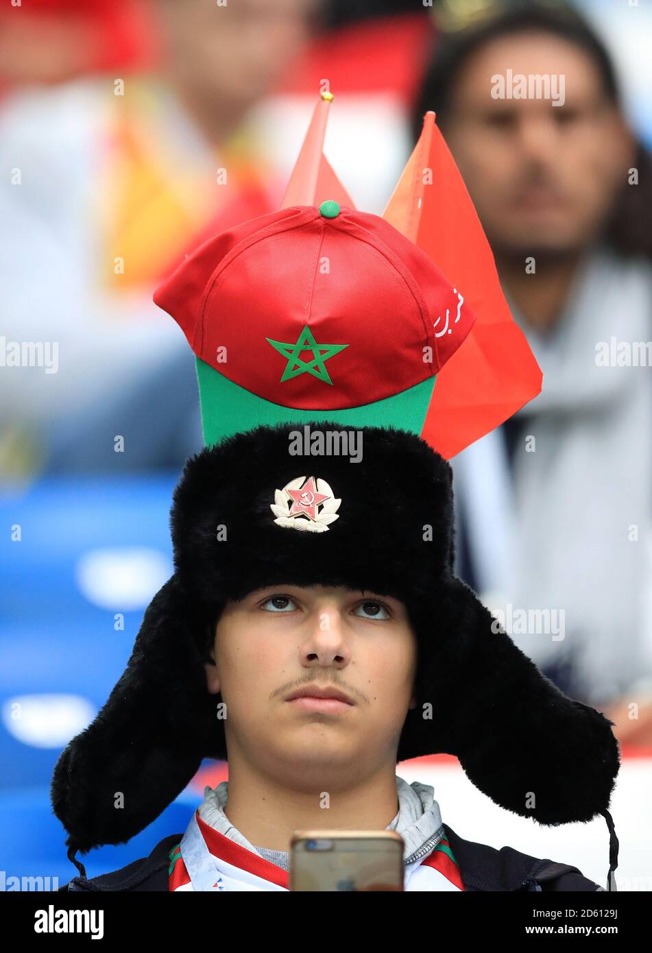 A Morocco fan in the stands Stock Photo - Alamy