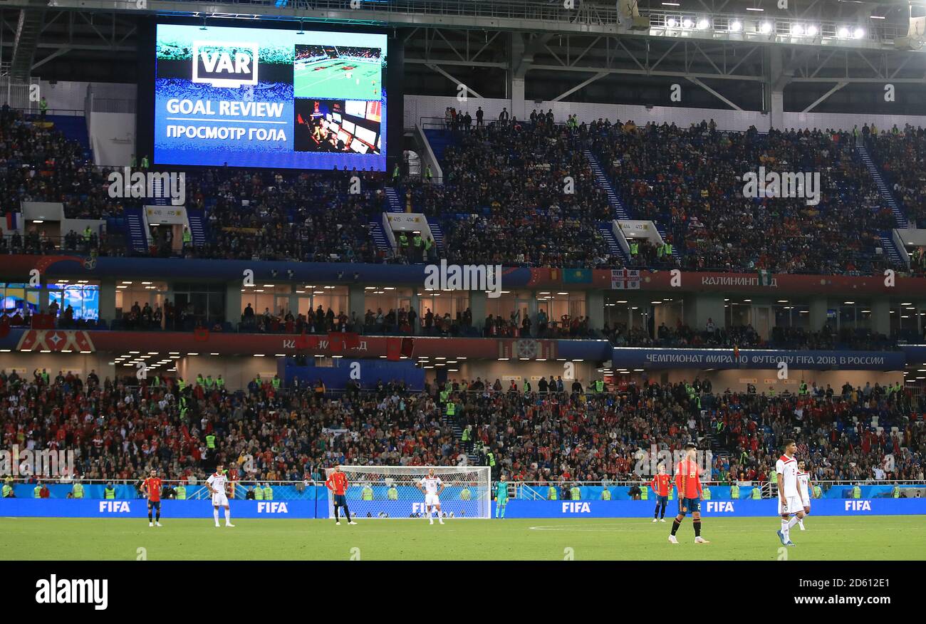 A big screen inside the stadium shows VAR in use during the game Stock ...