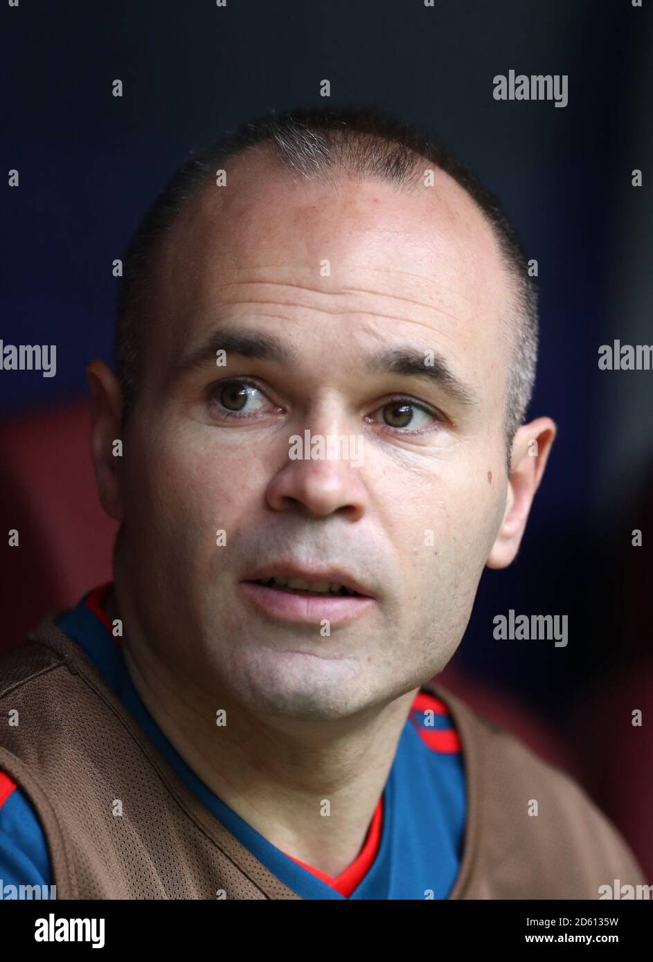 Spain's Andres Iniesta on the bench Stock Photo - Alamy