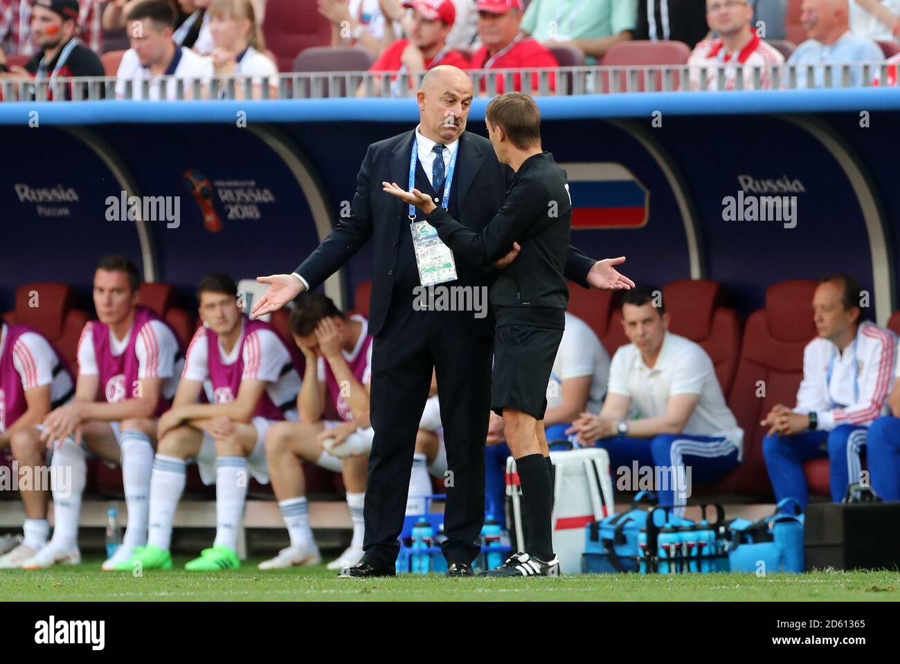Russia manager Stanislav Cherchesov speaks with an official Stock Photo ...