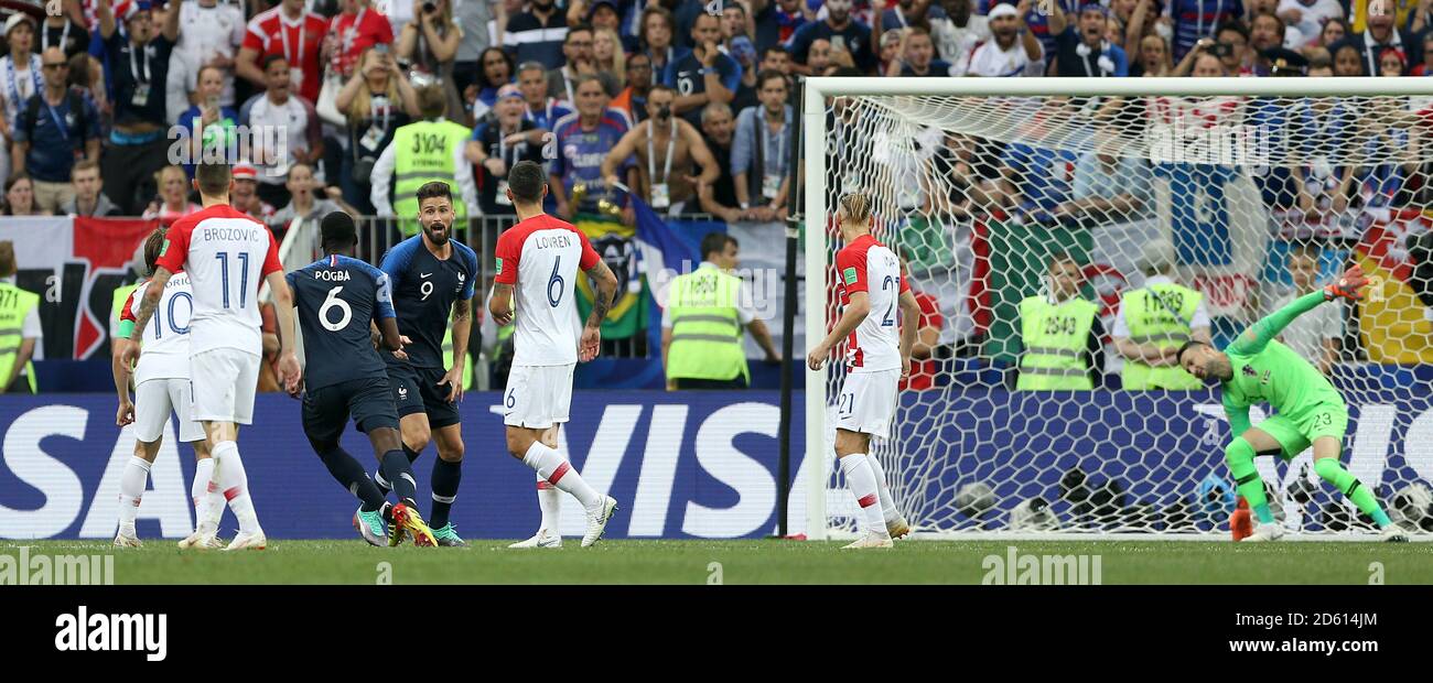 France's Paul Pogba turns to celebrate after scoring his side's third ...