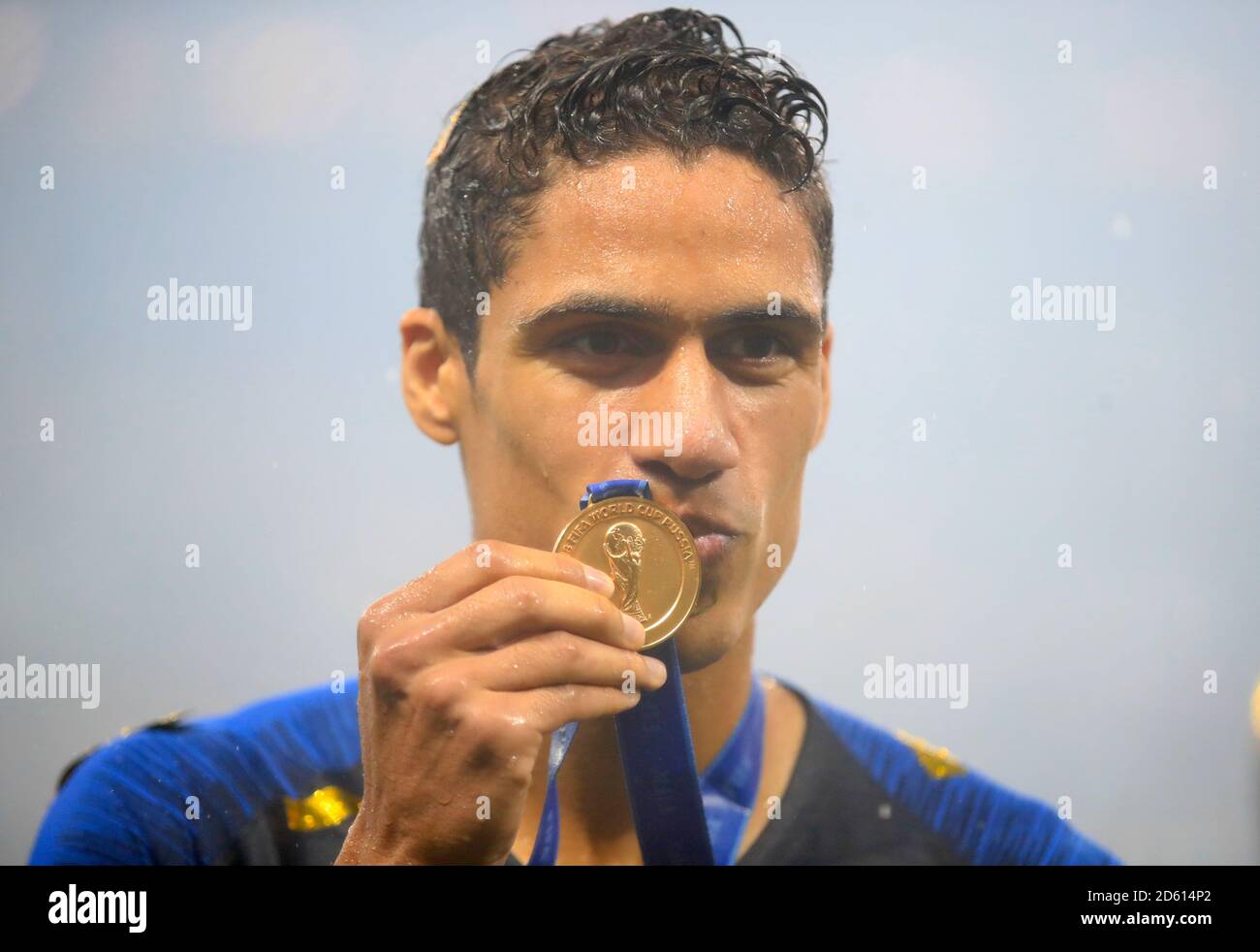 France's Raphael Varane celebrates with his medal after France win the ...