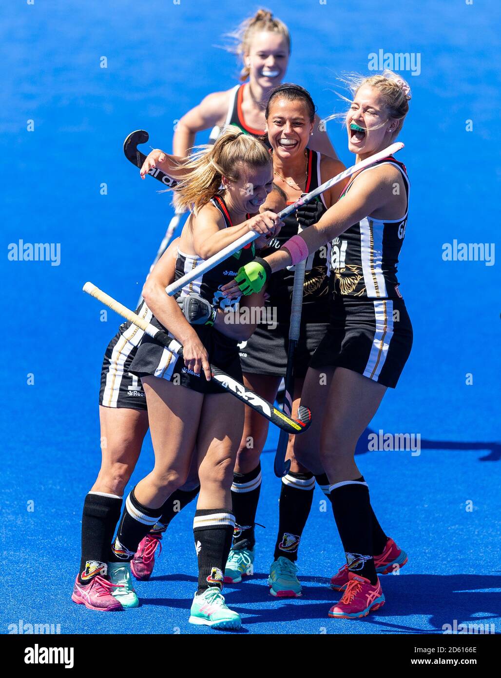 Germany's Anne Schroder (centre) celebrates scoring their first goal ...