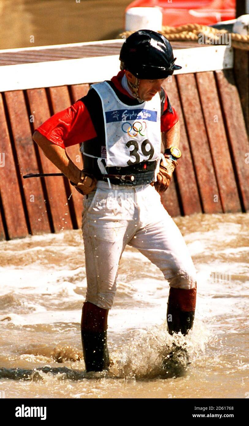 Great Britain's Ian Stark looks dejected after falling and consequently ...