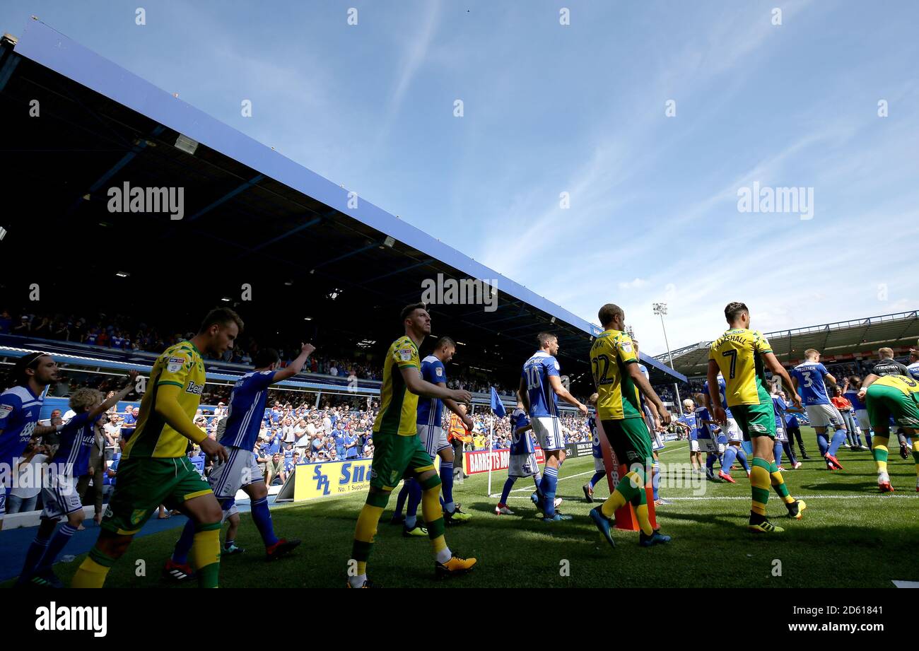 The two teams walk out before kick-off Stock Photo - Alamy
