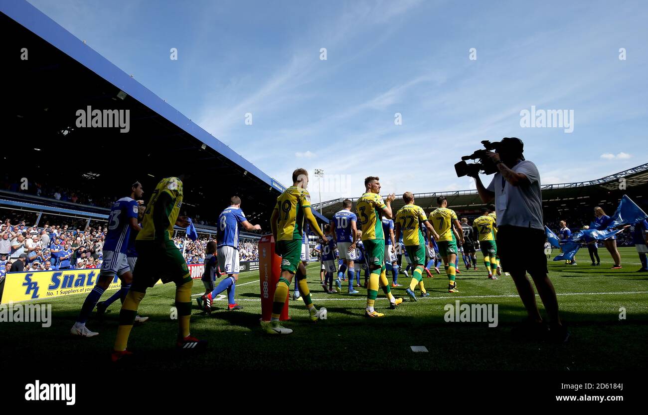 The two teams walk out before kick-off Stock Photo - Alamy