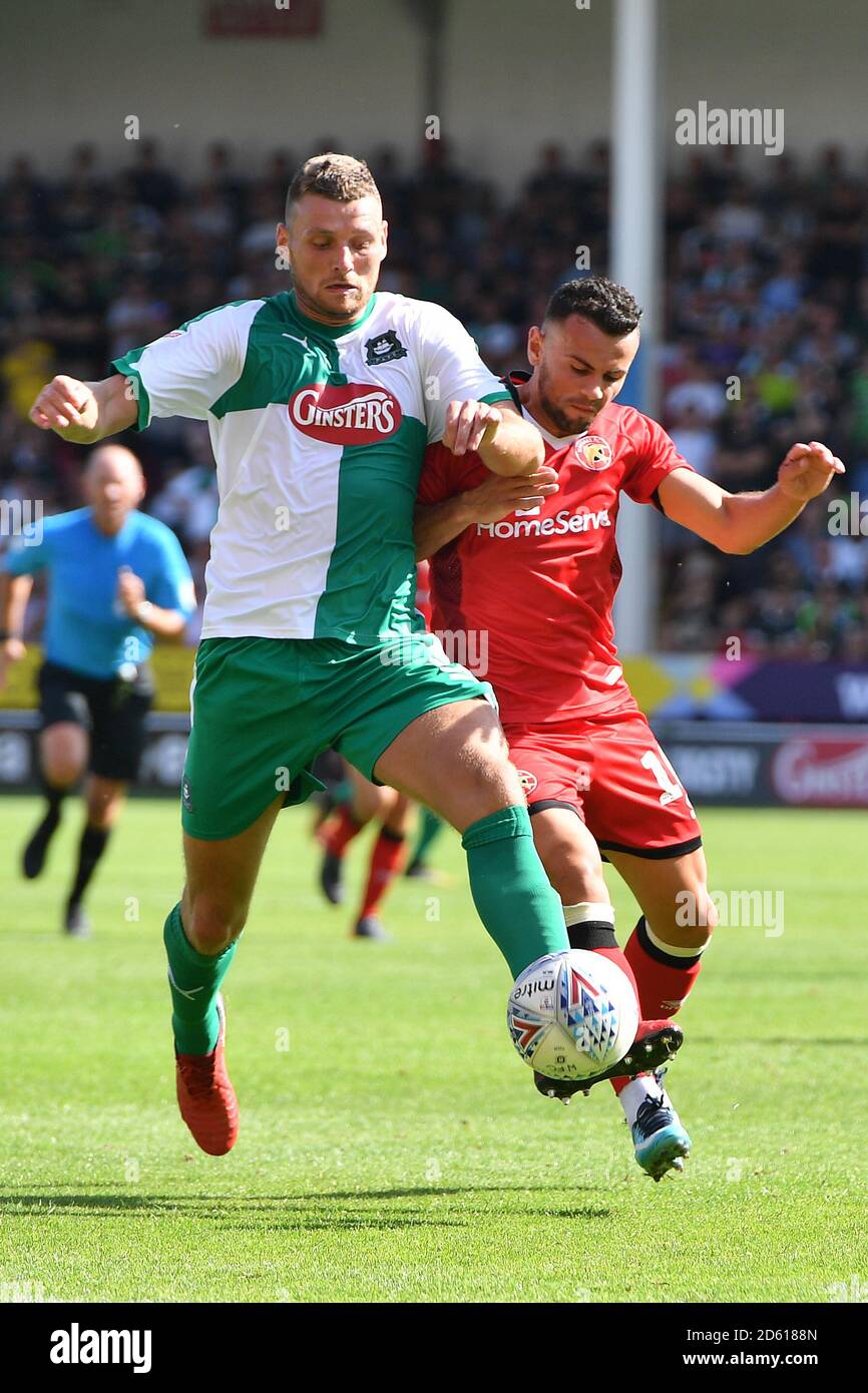 Walsall's Zeli Ismail and Plymouth Argyle's Ryan Edwards compete for ...