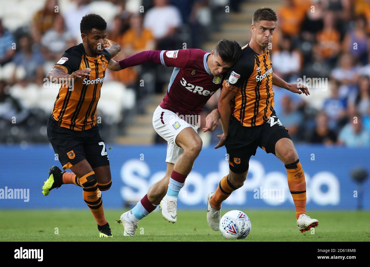 Hull City's (left-right) Markus Henriksen, Aston Villa's Jack Grealish ...